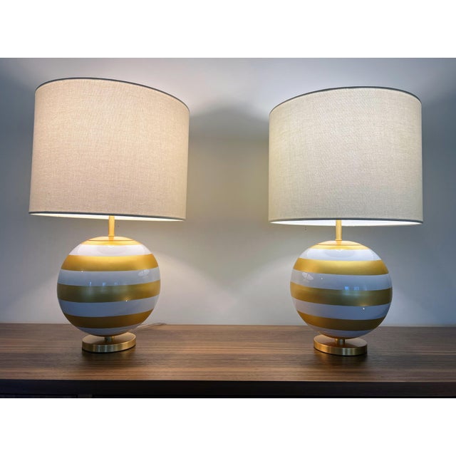 Contemporary Kate Spade New York Round Gold and White Striped Lamps - A ...