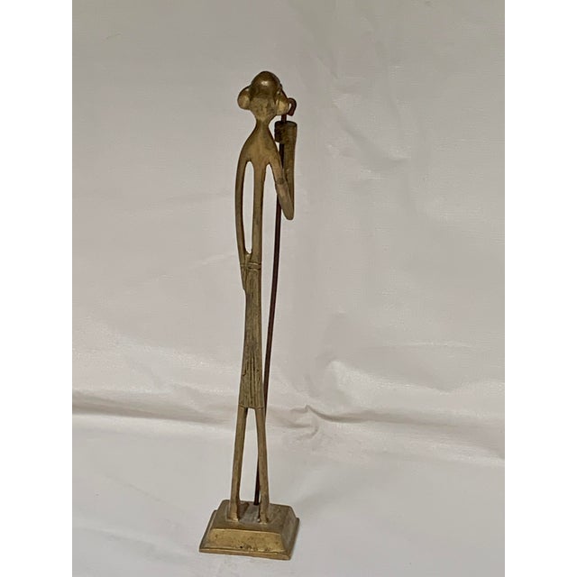 Vintage Brass Tribal Sculpture of a Shepard Man | Chairish