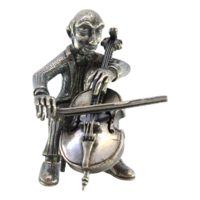 Silver Figure of Musician Playing the Cello | Chairish