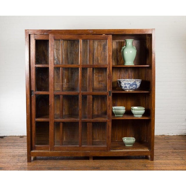 1940s Vintage Javanese Brown Wood Bookcase with Sliding Paneled Glass ...