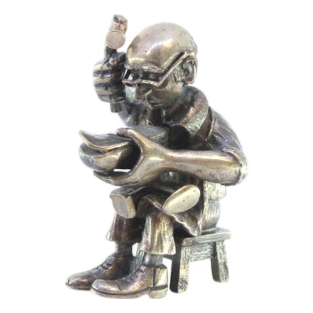 Figure of Seated Shoemaker Repairing Shoes in Silver | Chairish