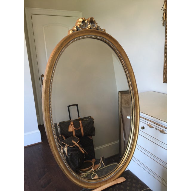 Louis XVI Gilt Oval Mirror With French Bow Swag | Chairish