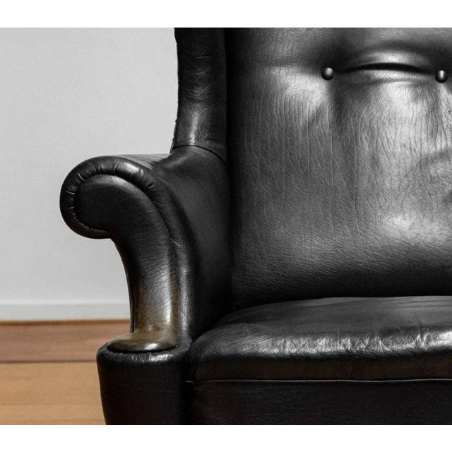 19th Century Black Leather Chippendale Wingback Chair with Claw and ...