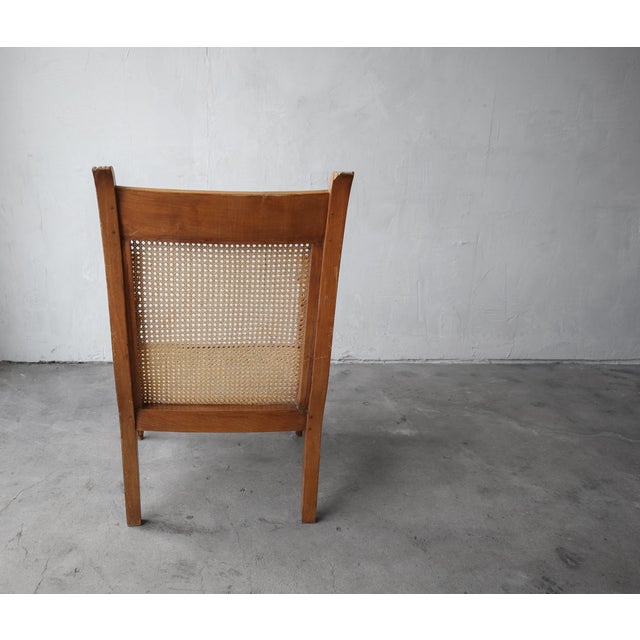 Antique British Colonial Cane and Carved Teak Lounge Chair | Chairish