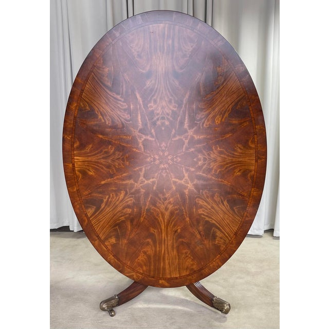 Oval Tilt Top Flame Mahogany Breakfast Table on Bronze Casters | Chairish