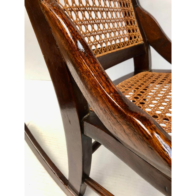 Vintage Mahogany Cane Back Child's Rocking Chair | Chairish