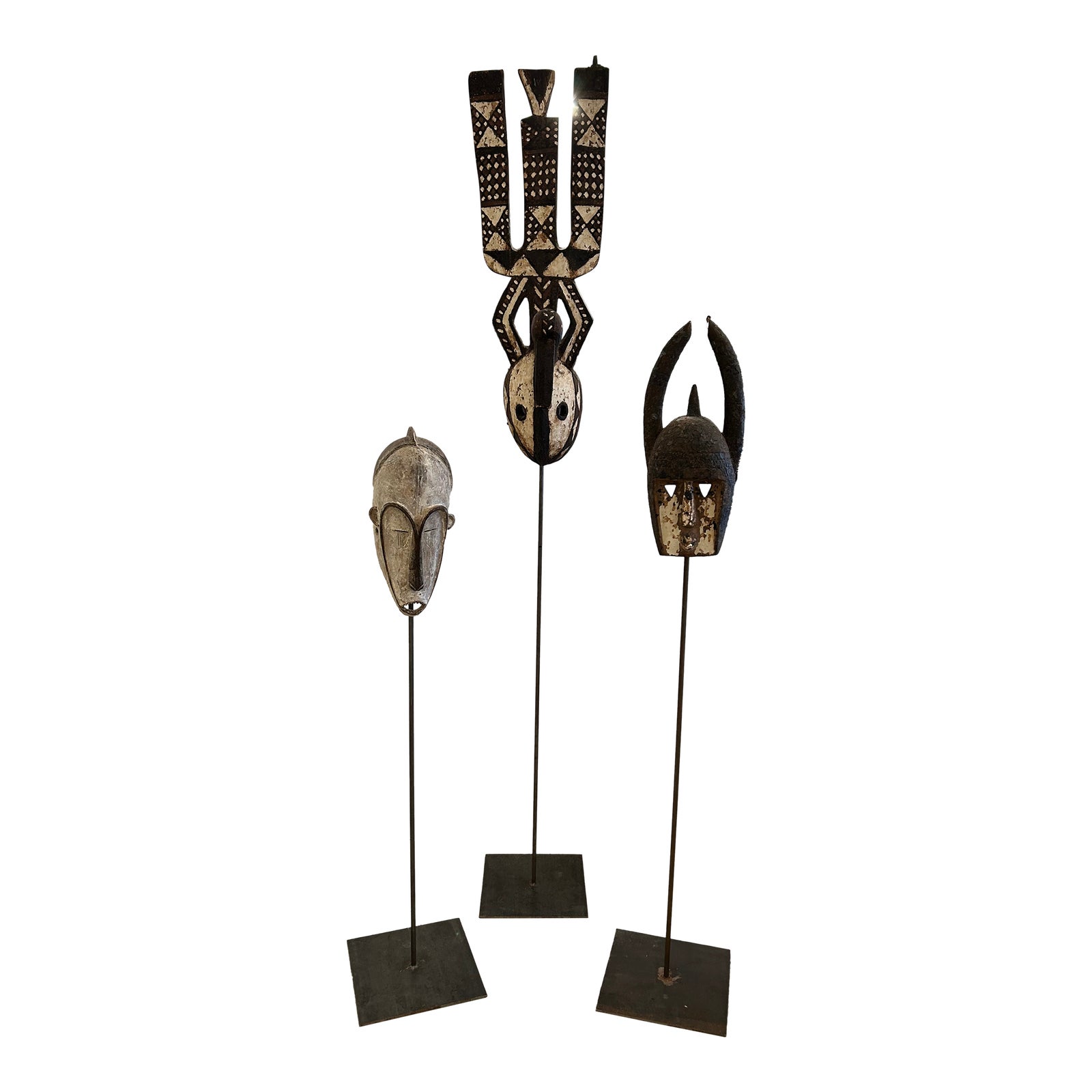 Collection of African Carved Wood Masks on Tall Custom Iron Stands ...
