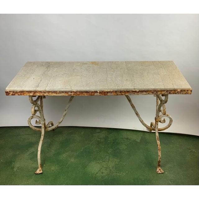 Salterini Style Wrought Iron Table with Travertine Top | Chairish