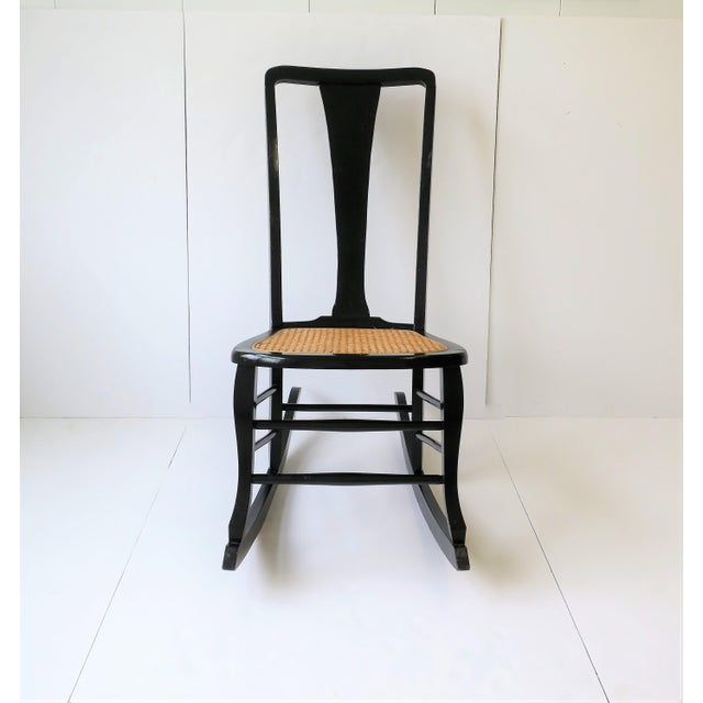 Vintage Mid Century Black Lacquer and Cane Rocking Chair | Chairish