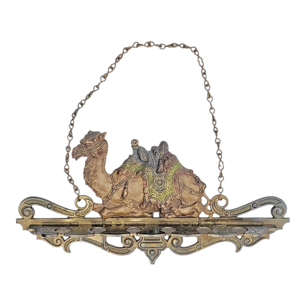 Antique 1910s Hanging Cast Iron Camel Pipe Rack by Cjo Judd | Chairish