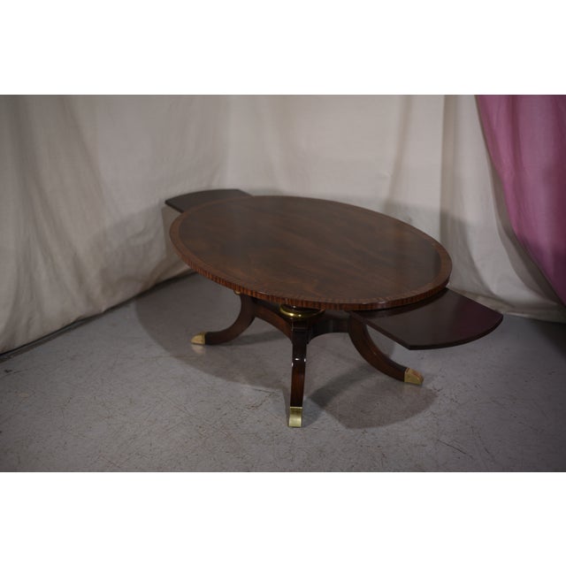 1950s Traditional Banded Mahogany Oval Pedestal Coffee Table by Charak ...