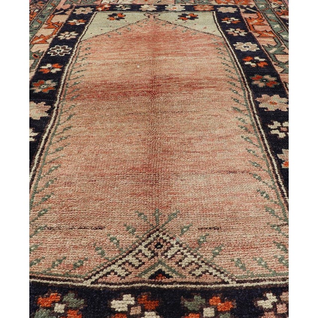 Vintage Turkish Oushak Rug In Solid Background With Multiple Defining Borders Of Geometric