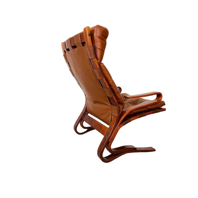 Vintage Scandinavian Cognac Lounge Chair and Foot Stool by Oddvin ...