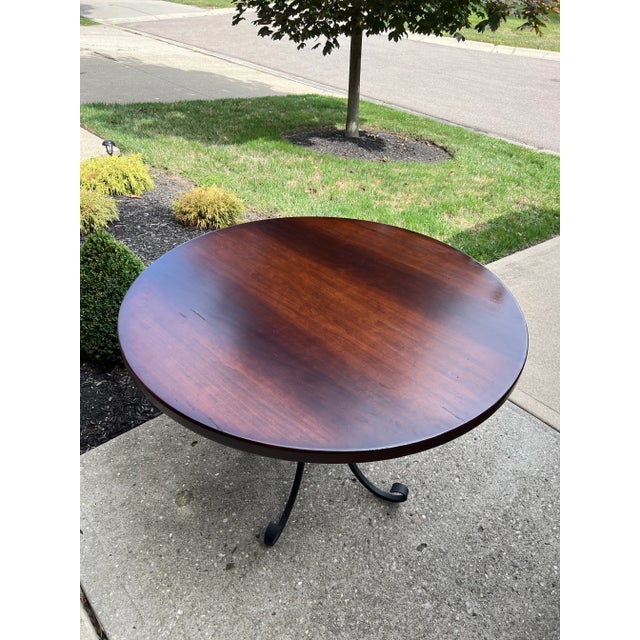 Arhaus Wood Round Dining Table Arabesque Wrought Iron Base | Chairish