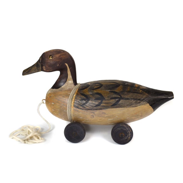 Vintage Wood Carved Painted Duck on Wheels Pull Toy | Chairish