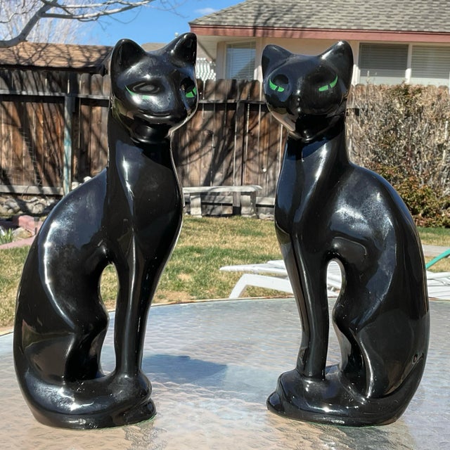 Mid Century Pair of Black Atomic Cats With Green Eyes | Chairish