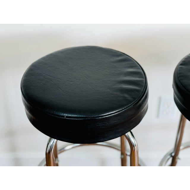 Vintage 1970s Black Vinyl Swivel Bar Stools, a Pair | Chairish