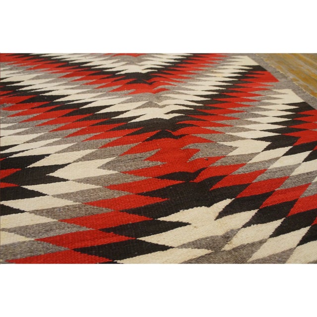 Early 20th Century American Navajo Eye Dazzler Carpet | Chairish