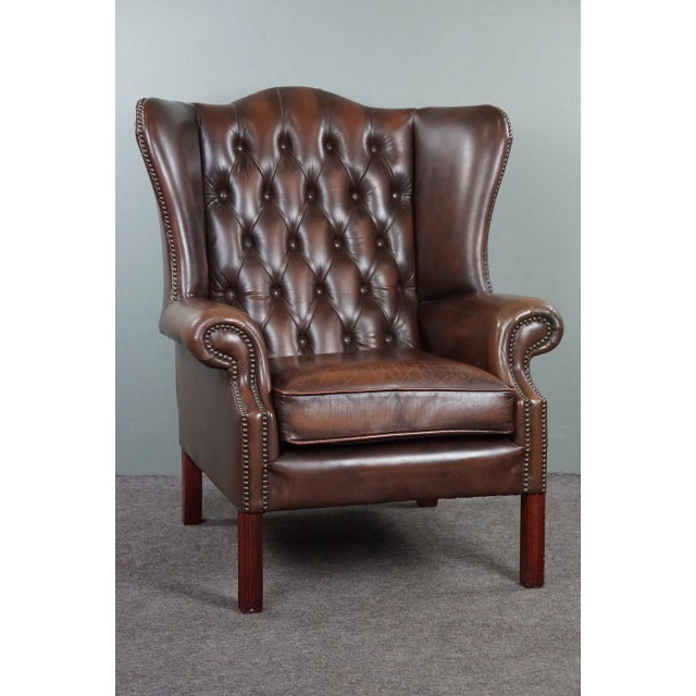 Brown leather armchair vintage store