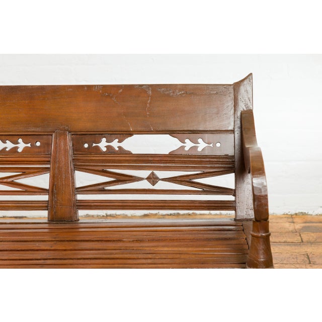 Dutch Colonial Bench with Carved Back, Scrolling Arms and Turned ...