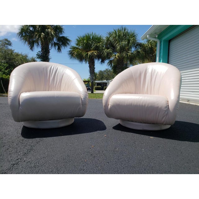 Natuzzi Light Pink Leather Rolled Arm Plinth Swivel Base Chairs - a ...