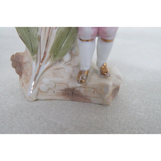 Porcelain Boy and Flower Figurine Vase | Chairish