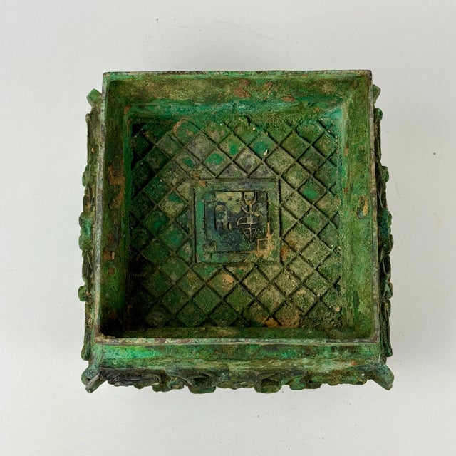Early 20th Century Chinese Bronze Square Vessel With Beast Faces | Chairish
