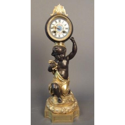 Putti Figural Doré and Patinated Bronze Ball Clock | Chairish